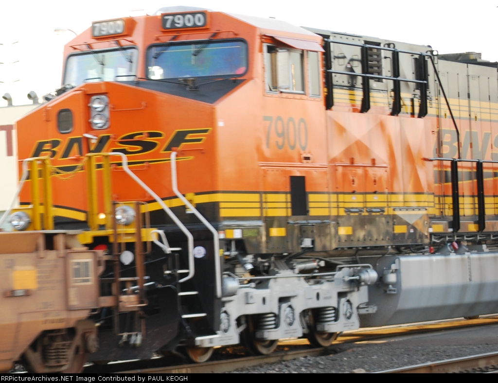 BNSF 7900 rolls west as a rear DPU unit with her Sister BNSF 7902 as the last unit on a ...